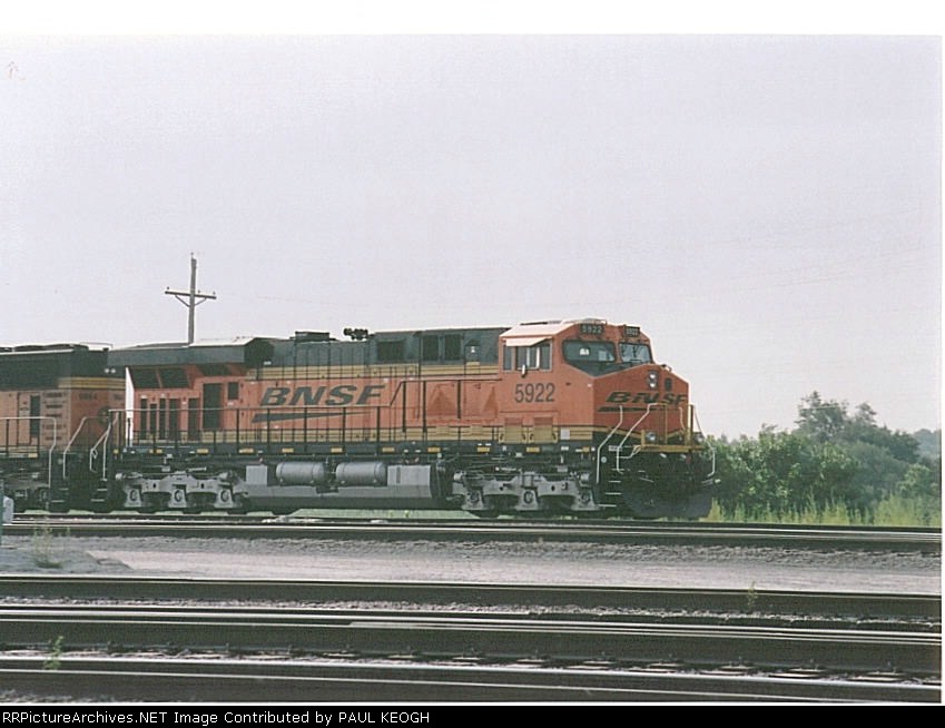 BNSF 5922 rear DPU on a loaded coal train at Cushman Junction.
